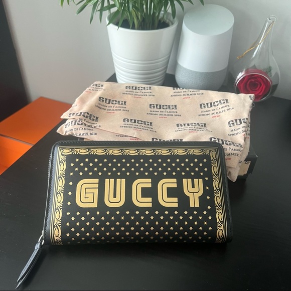 Gucci | Bags | Gucci Large Guccy Black And Gold Wallet Nwt | Poshmark